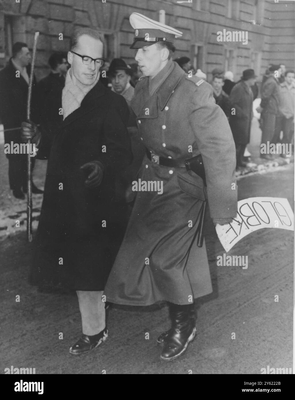 A POLICEMAN LEADS AWAY A DEMONSTRATOR AT THE STUDENTS ANTI-NAZI PROTEST ...