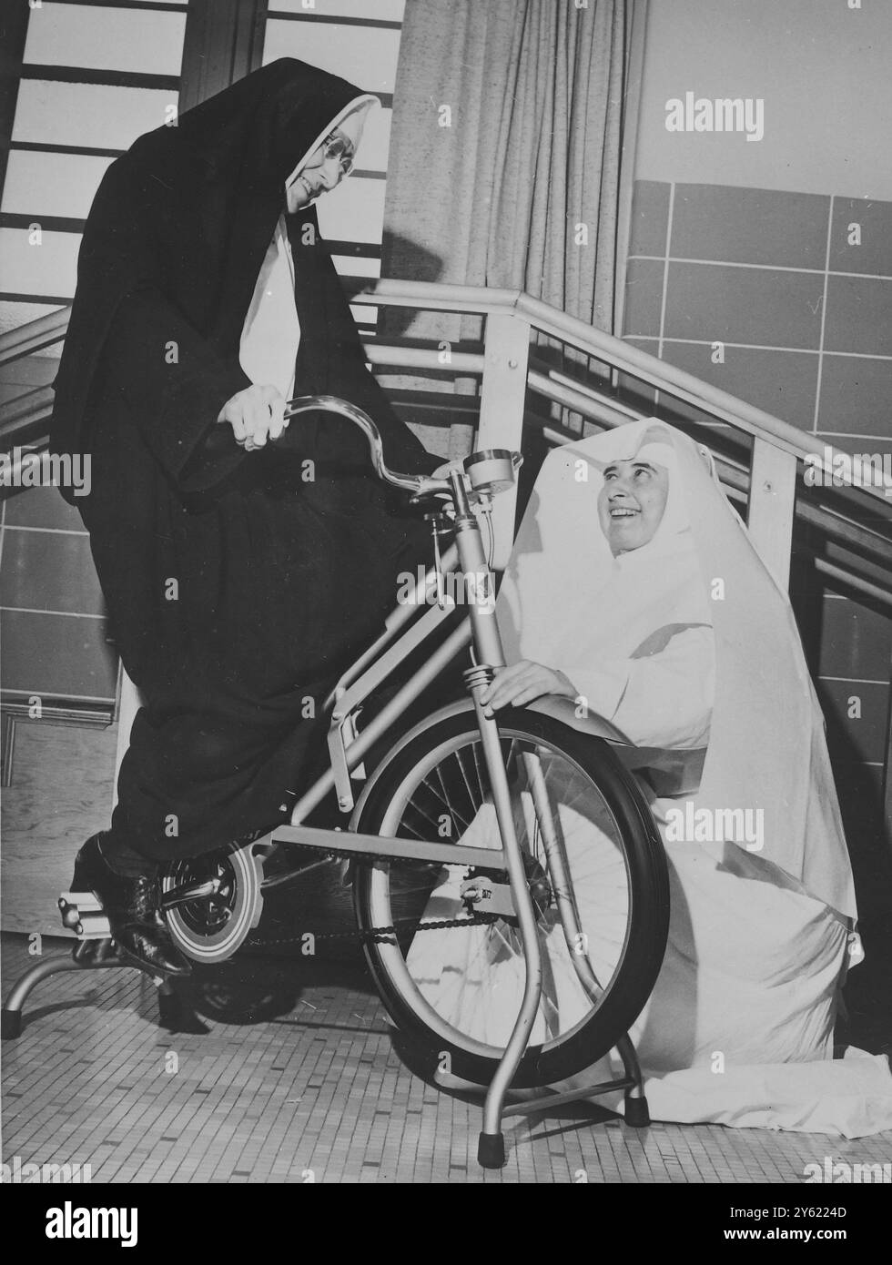 A MEDICAL NUN PHYSICAL THERAPIST SISTER MARY THEOPANE (RIGHT) SMILES AT ...