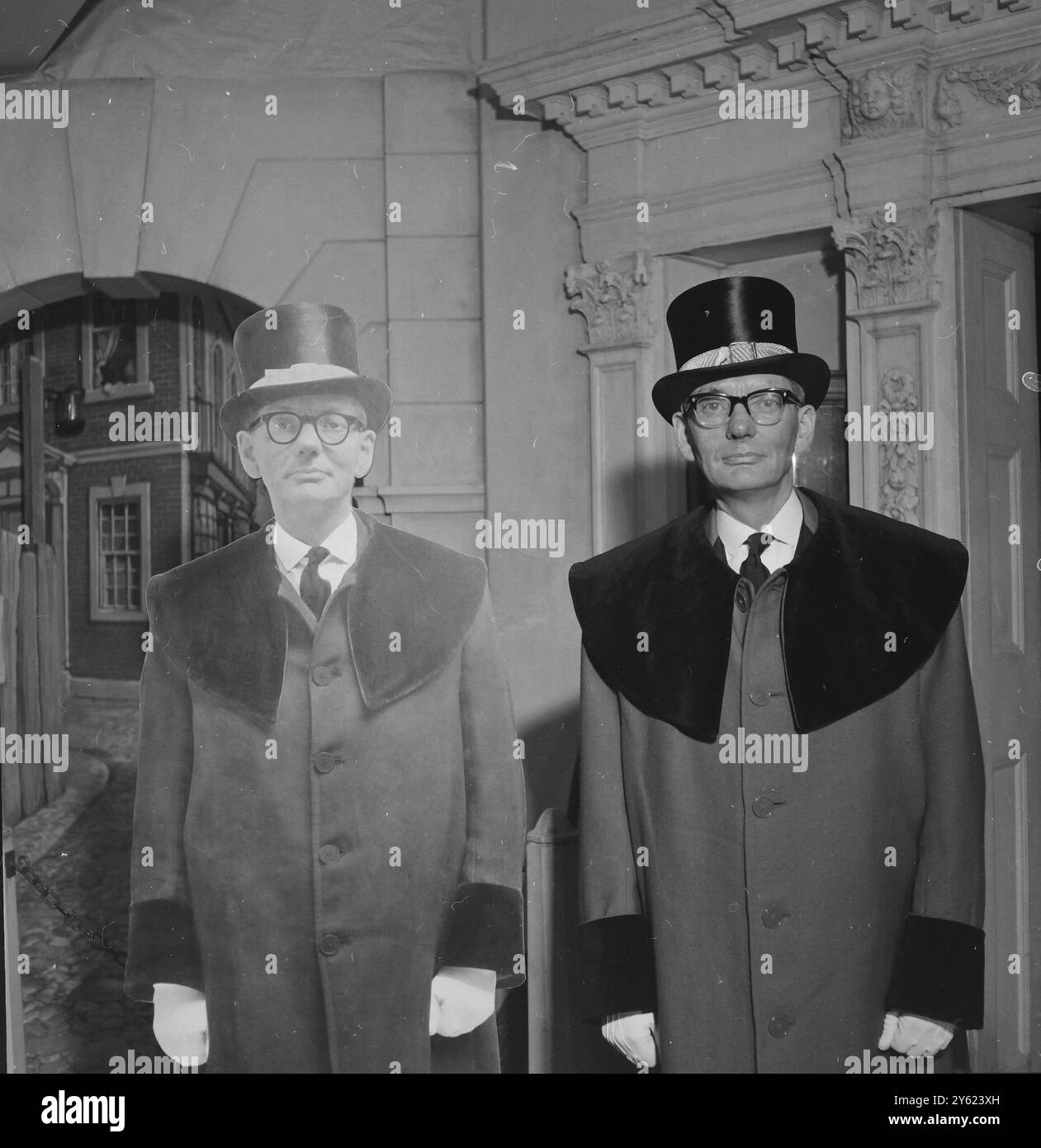 JOHN ADDISON STANDS BESIDE A PHOTO CUT OF HIMSELF 11 JANUARY 1960 Stock ...