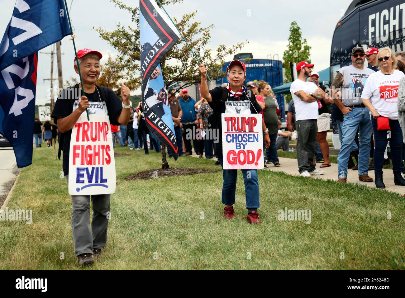 Katie Mimura, left, and Hisako Kaneko, center, who traveled from Japan ...