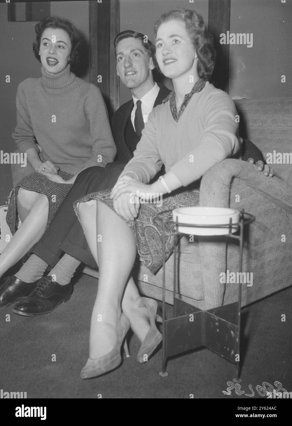 THE TWO STEWARDESSES AND THE STEWARD OF THE GUTTED BEA PLANE THAT ...