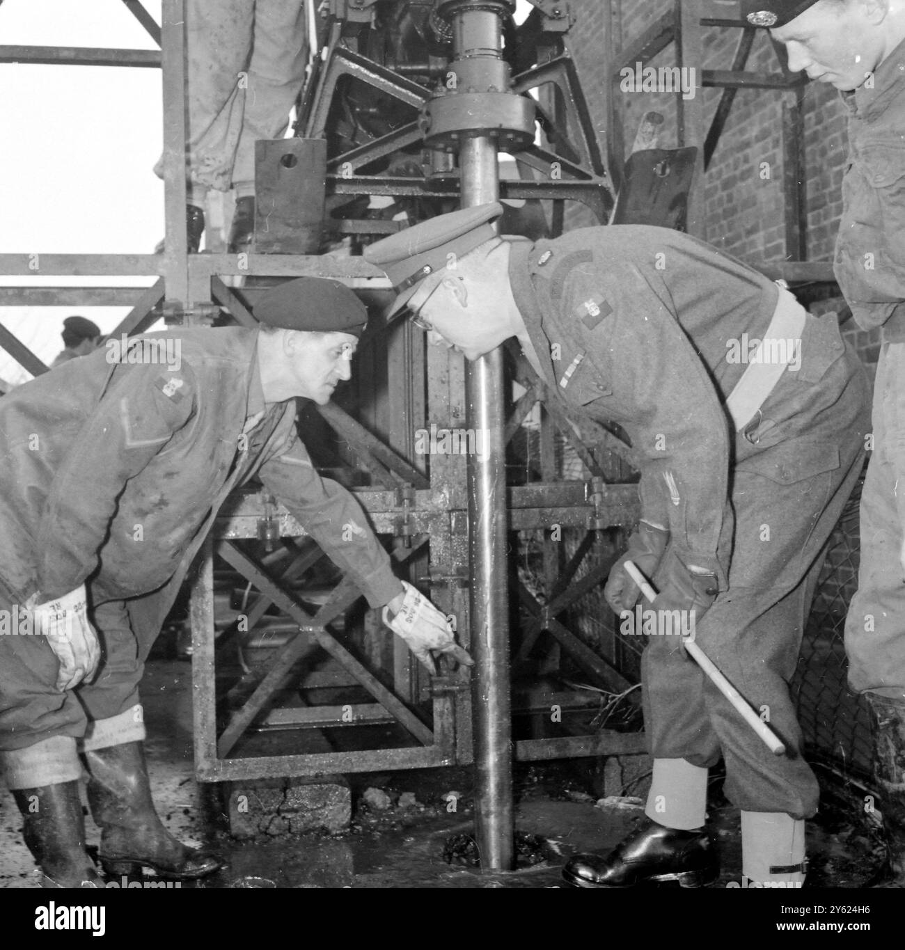 MAJOR BILL HARTLEY OF THE BOMB DISPOSAL SQUAD DIRECTS OPERATIONS ON THE ...