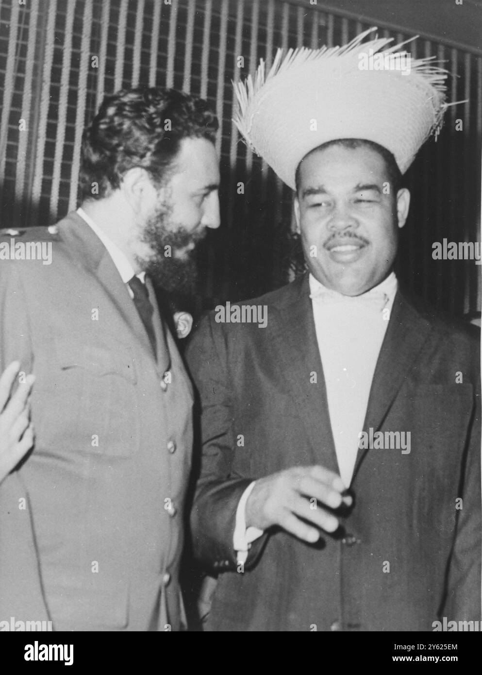 FIDEL CASTRO ( LEFT ) AND BOXER JOE LOUIS AT DINNER AT THE HAVANA ...