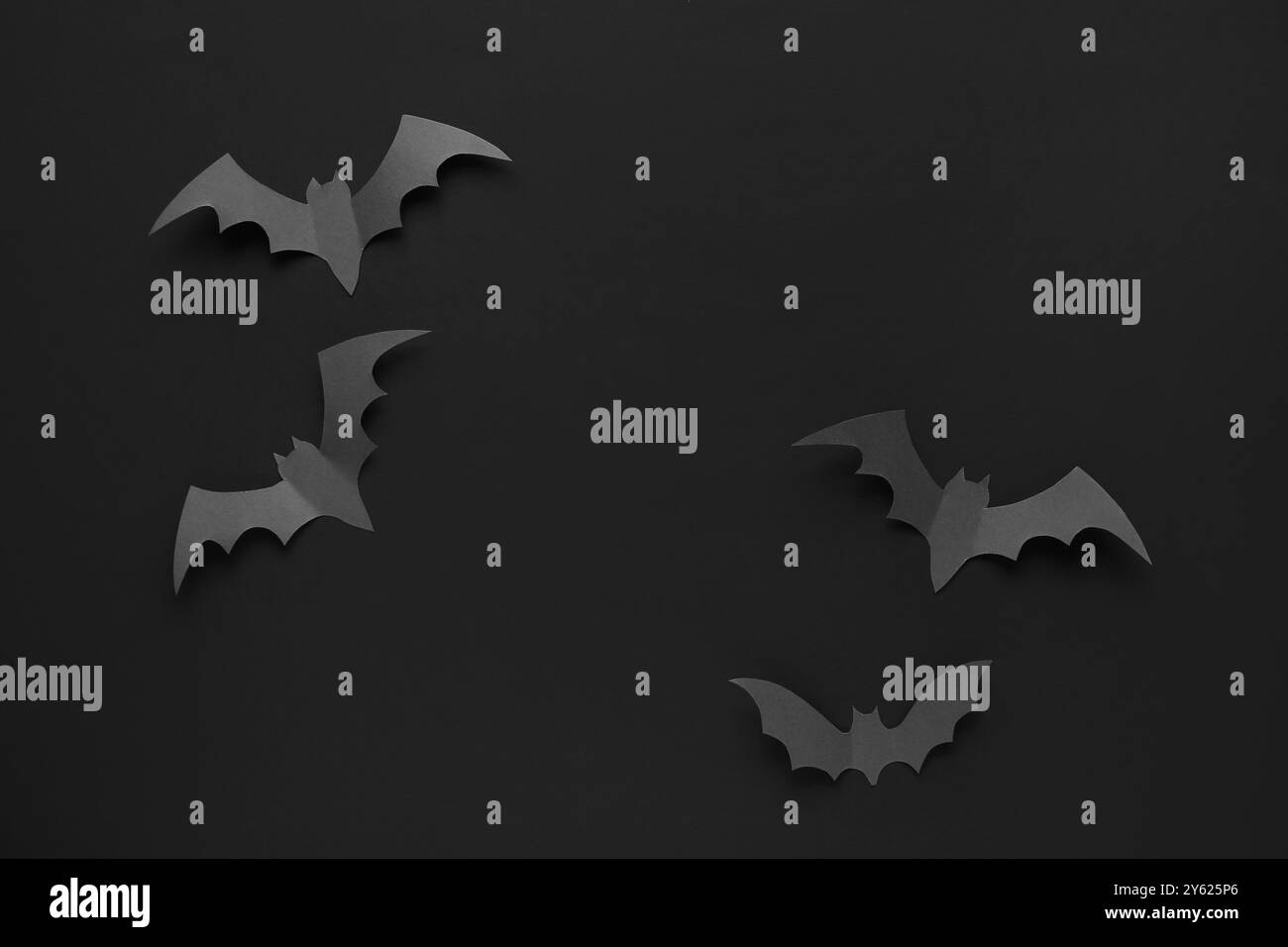 Halloween decorations on black background Black and White Stock Photos ...