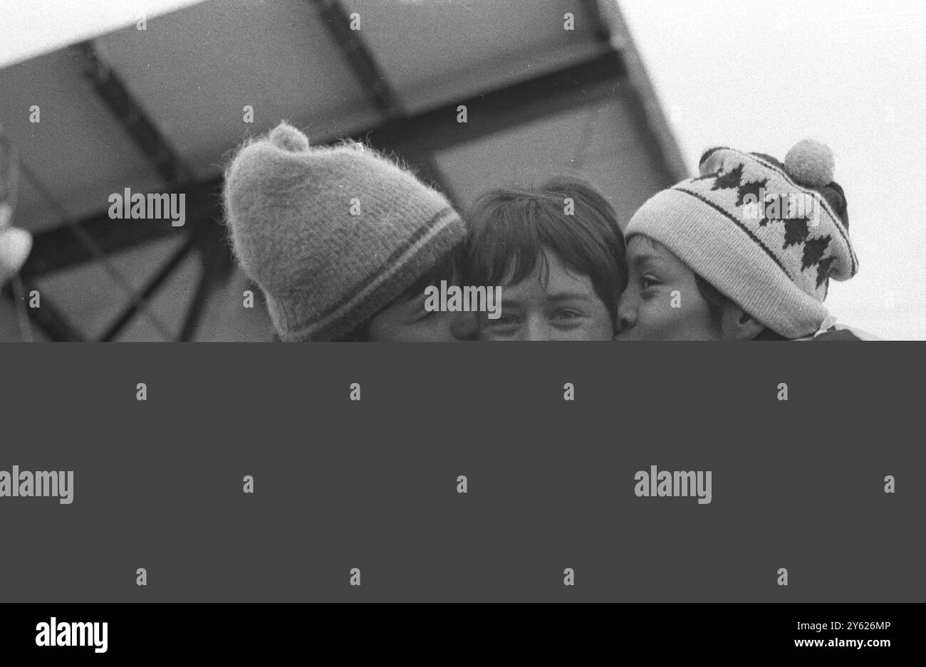 Kisses for Nancy Green of Canada ( centre ) after she won the gold ...