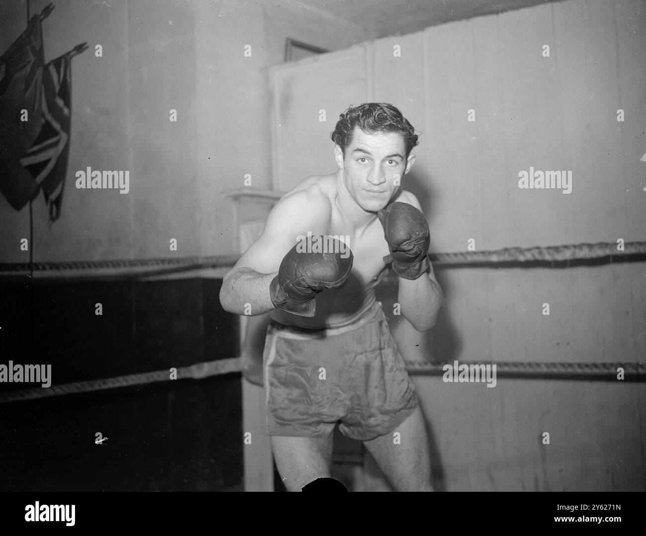 Two-fisted Billy Coulolias of Oakland, New Zealand, made his debut as a professional boxer by ...