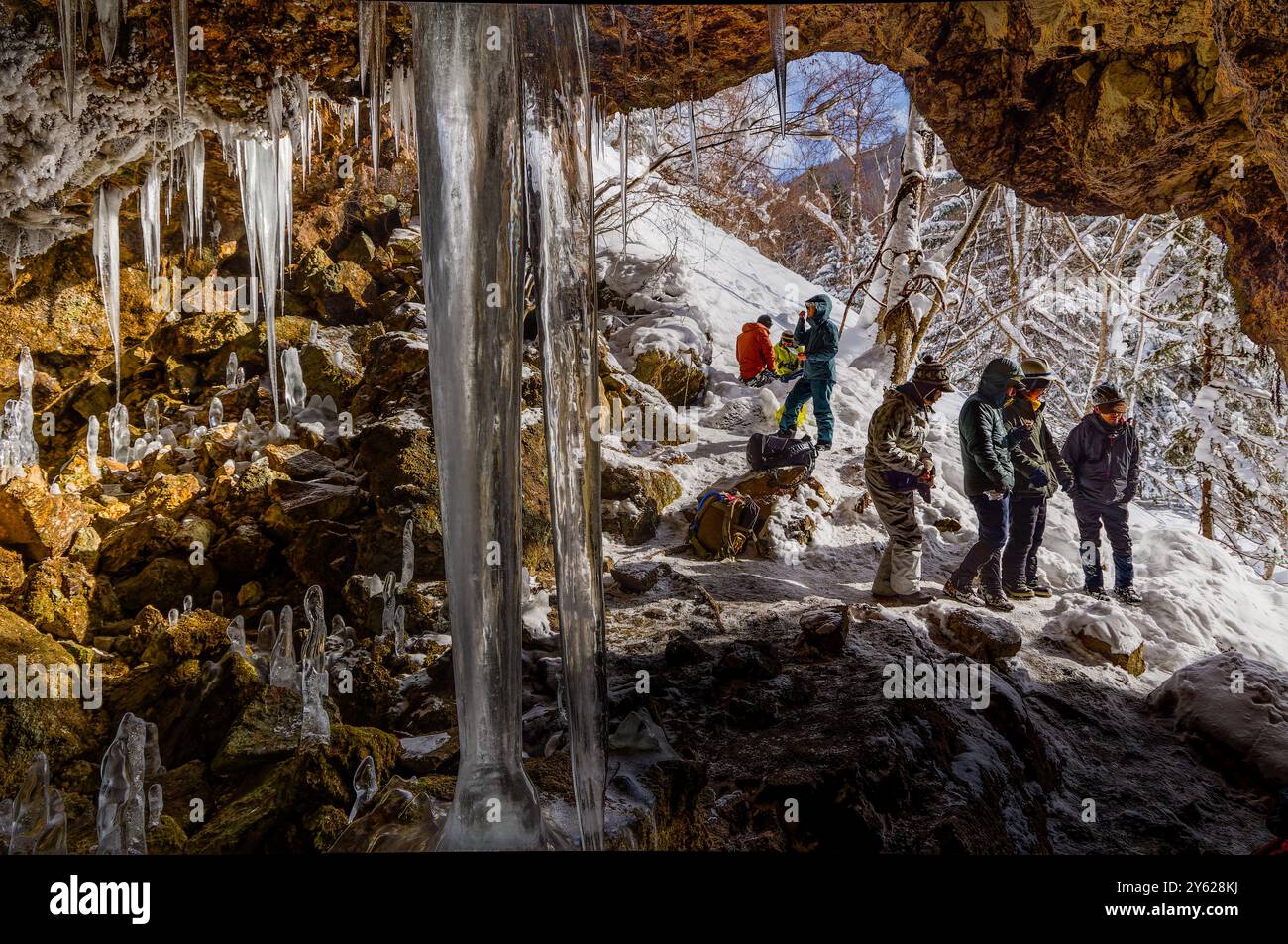 Hikers in the snow outside the Otaki "frozen bamboo cave" in the ...