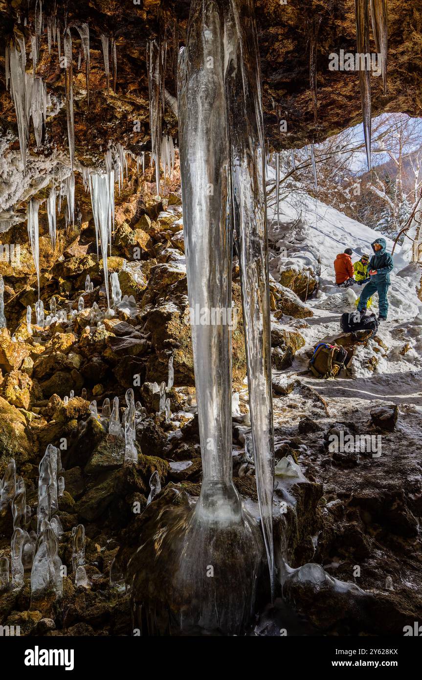 Hikers in the snow outside the Otaki "frozen bamboo cave" in the ...