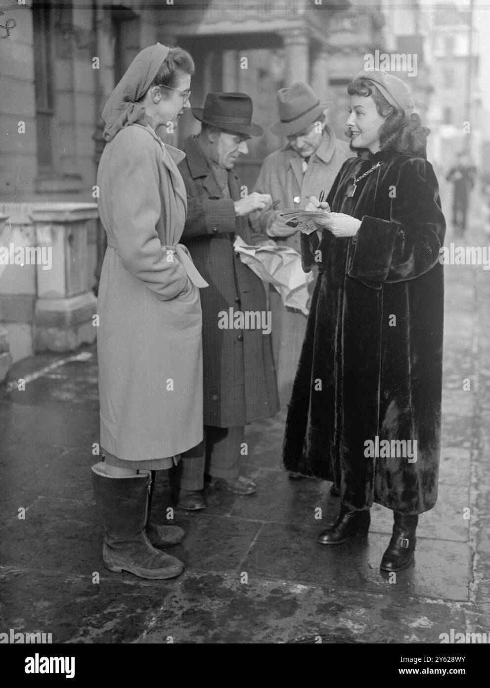 Busy on a 'Crown Film' unit film "A Yank Returns to Britain" is screen ...