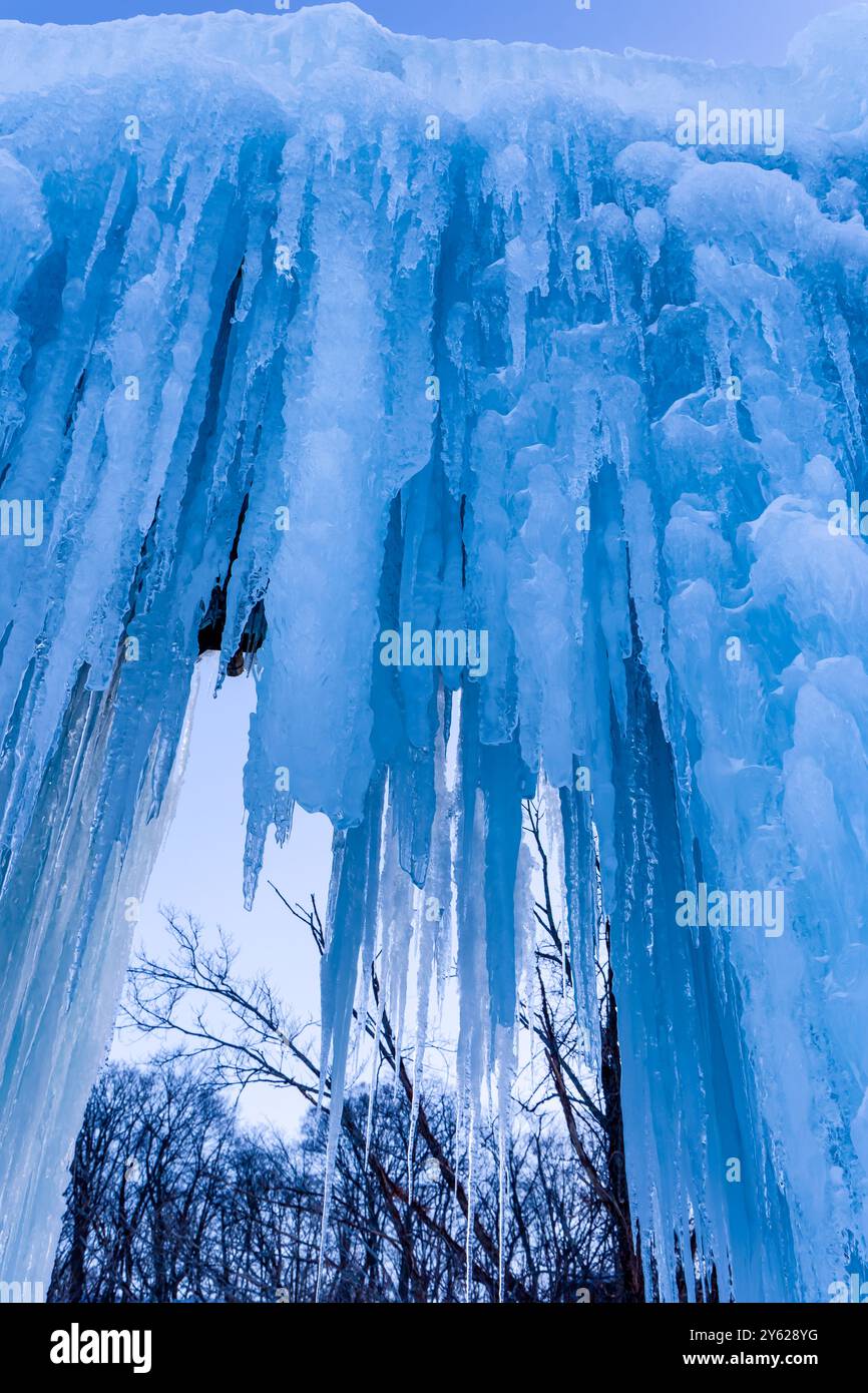 Frozen vertical ice pillars at Lake Shikotsu at sunset Stock Photo - Alamy