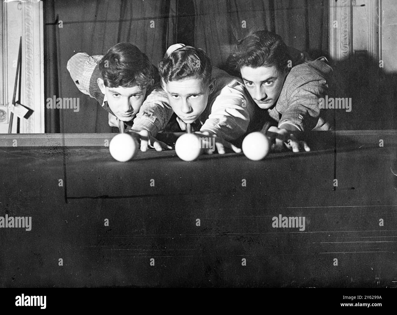 Three cue Black and White Stock Photos & Images - Alamy