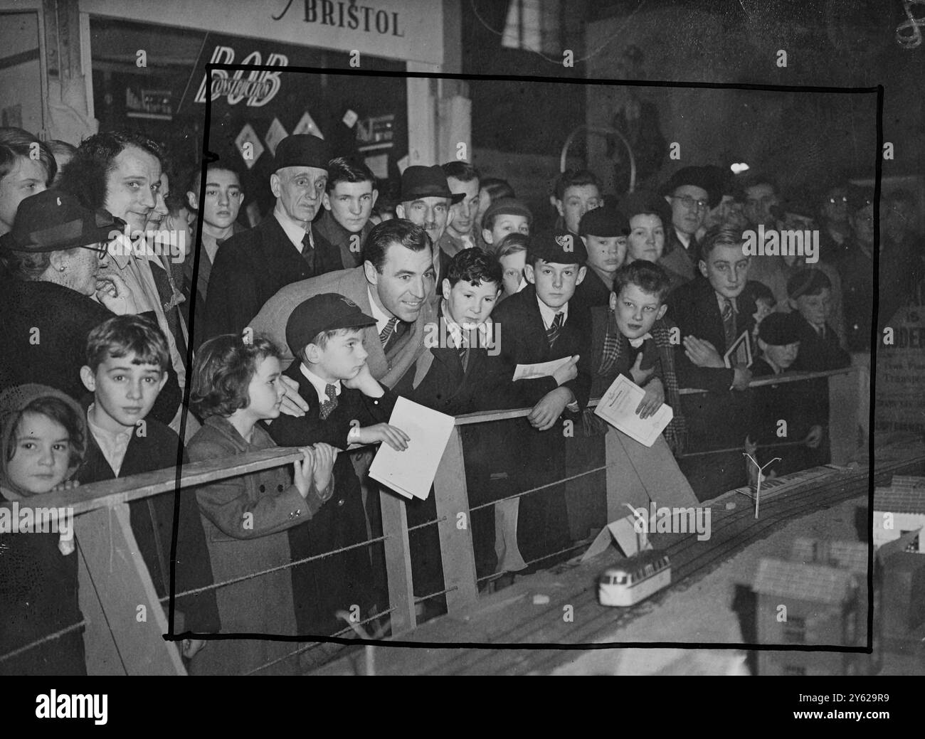 Screen star David Farrar is as keen as any schoolboy as he studies the ...