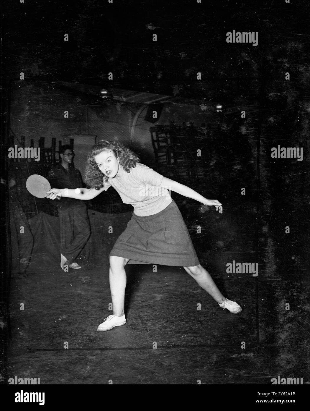 Playing in the first round of the Women's Singles Section of the ...