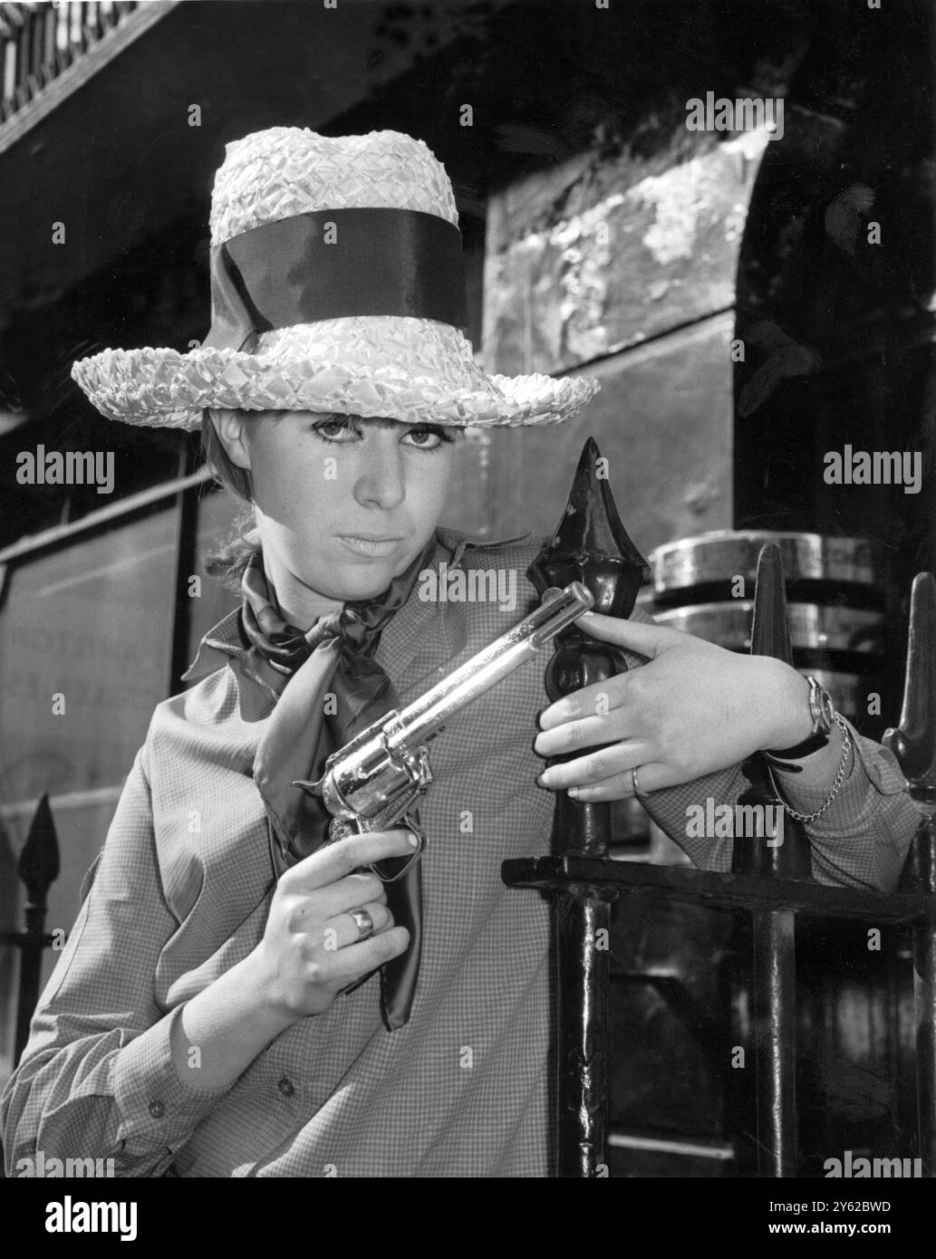 Mean looking gun slinging type in the tall crowned straw stetson is ...