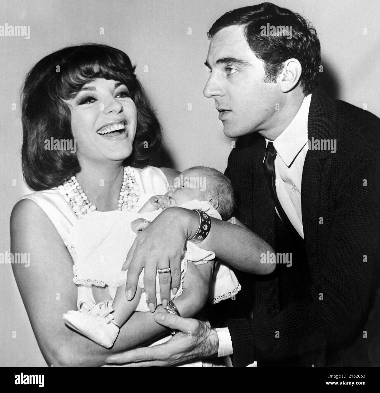 19 OCTOBER 1963 JOAN COLLINS AND ANTHONY NEWLEY PRESENT THEIR NEW BORN ...