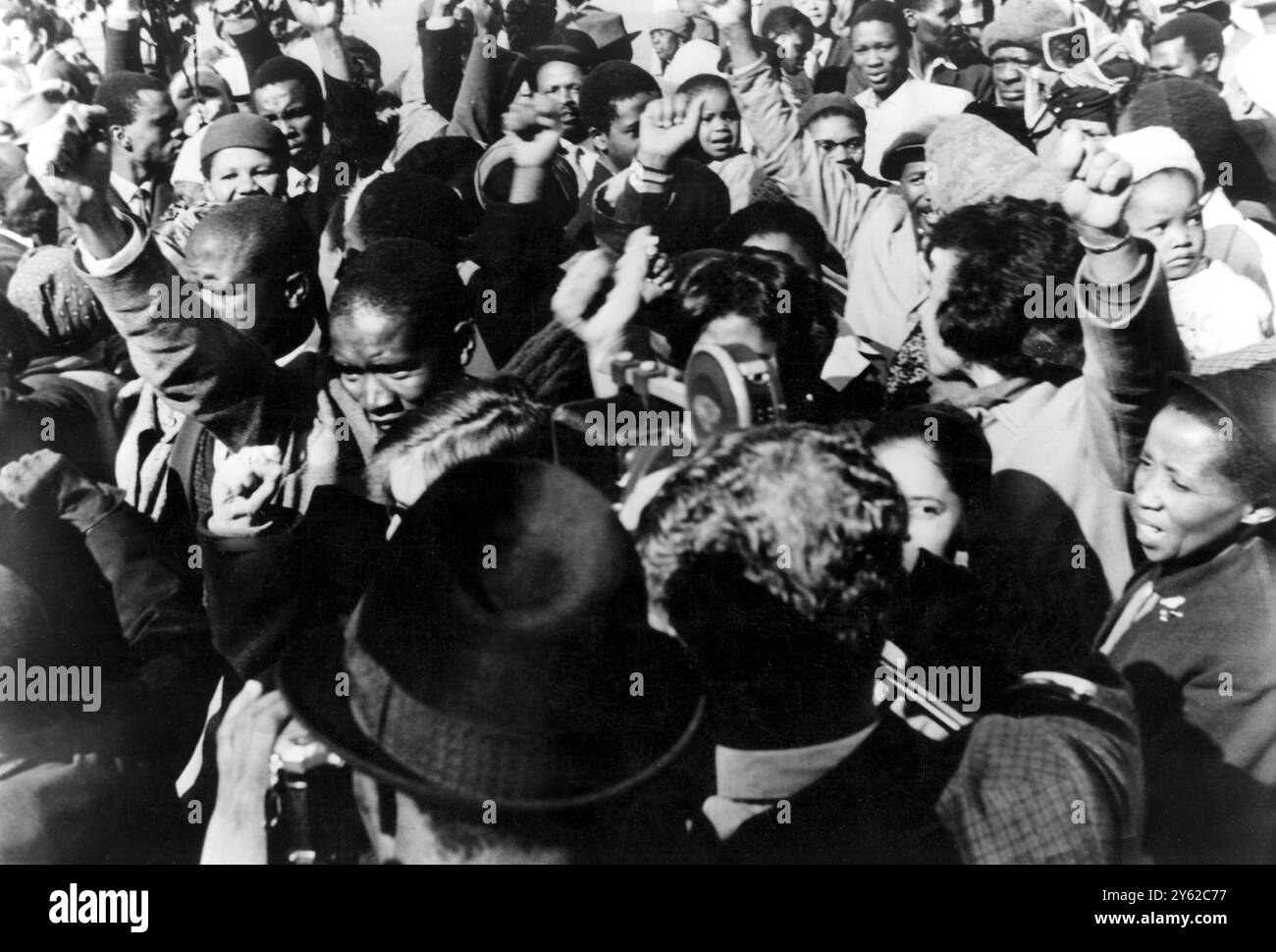 Africans assembled outside Pretoria Supreme Court raise their fists in ...