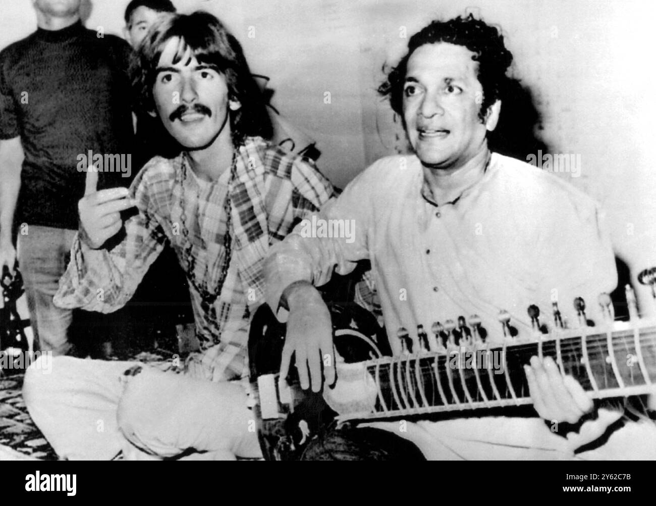 Hollywood, USA - George Harrison sits alongside Ravi Shankar of India ...