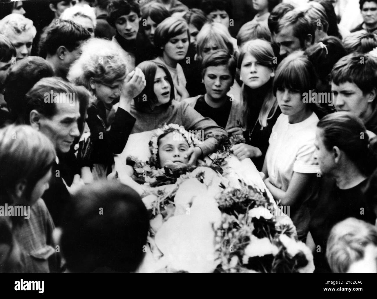 Prague Spring 1968 Weeping mourners crowd round the bier of five year ...