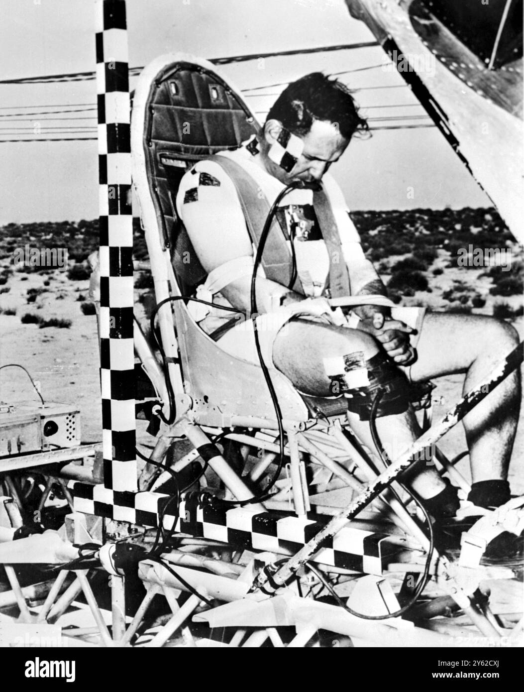The 43 year old colonel, John P. Stapp is shown seated on a "rocket ...