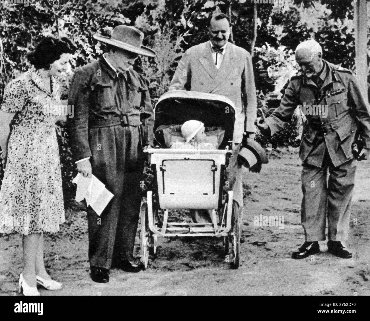 In the gardens of the British Embassy at Cairo , (left to right) lady ...
