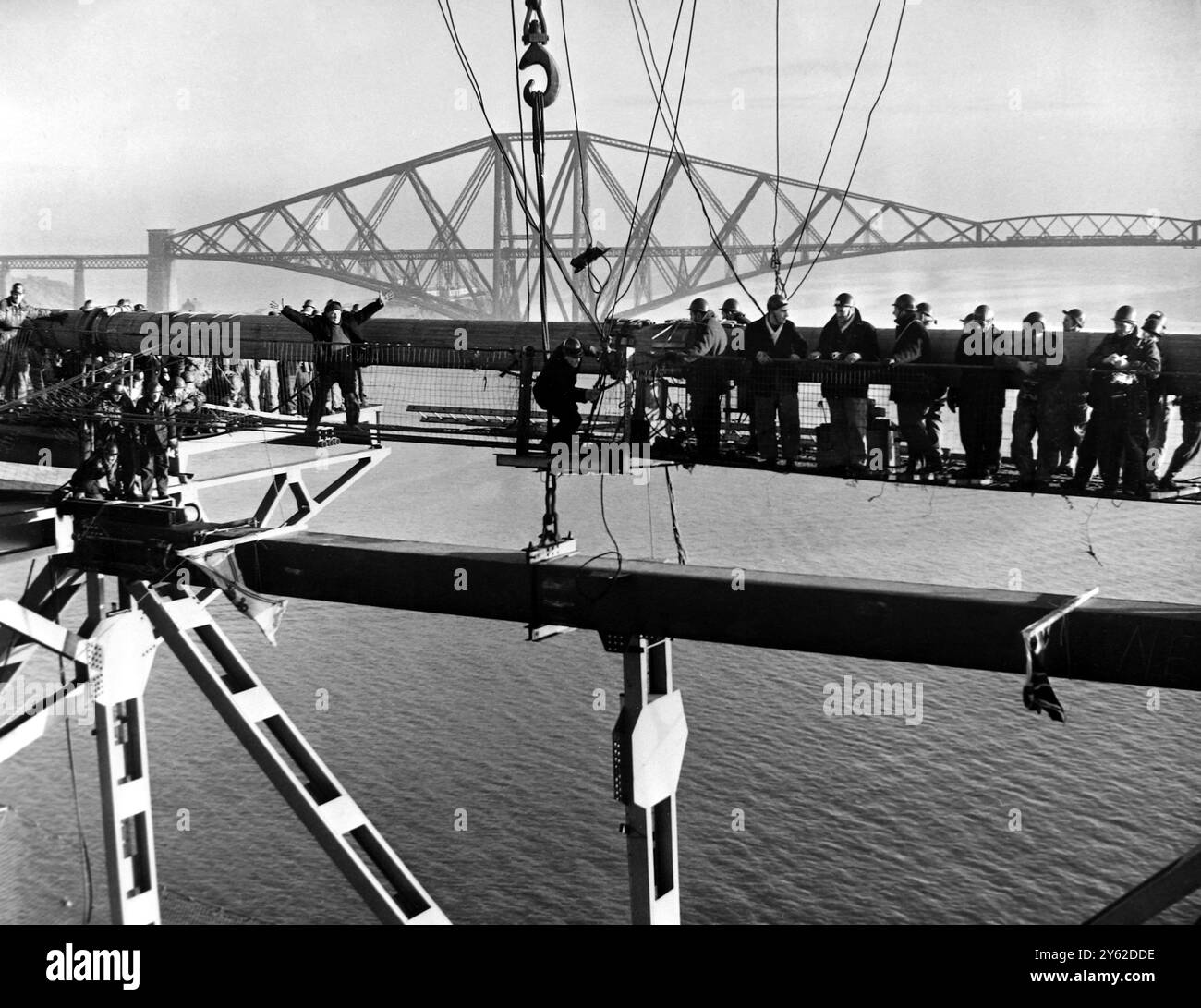 23 DECEMBER 1963 THE FINAL TRUSS OF THE FORTH ROAD BRIDGE IS RAISED ...