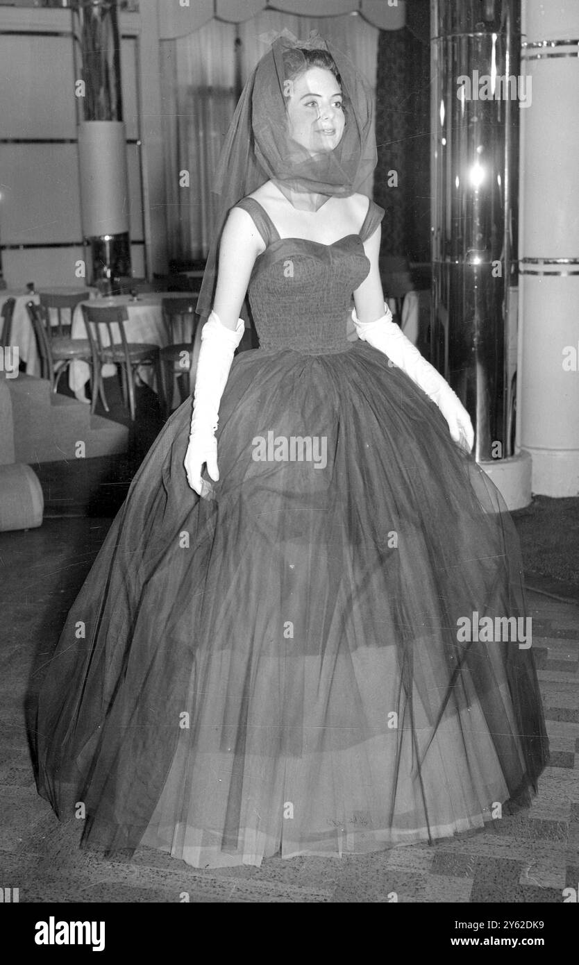 Debutante Sally Sherston Baker models a Victor Stiebel dress for the ...