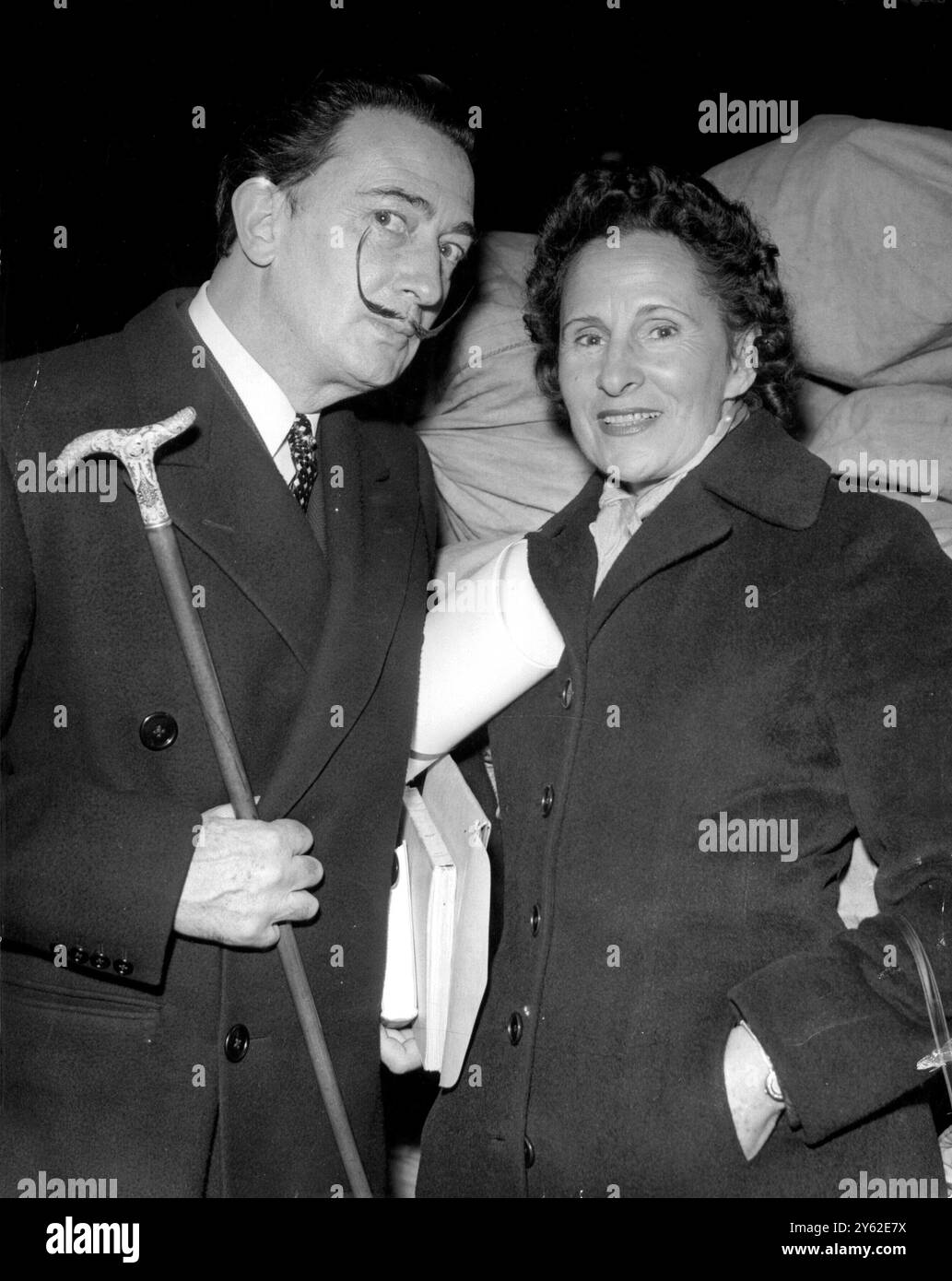 Salvador Dali with his wife Gala leaving London for Barcelona April ...
