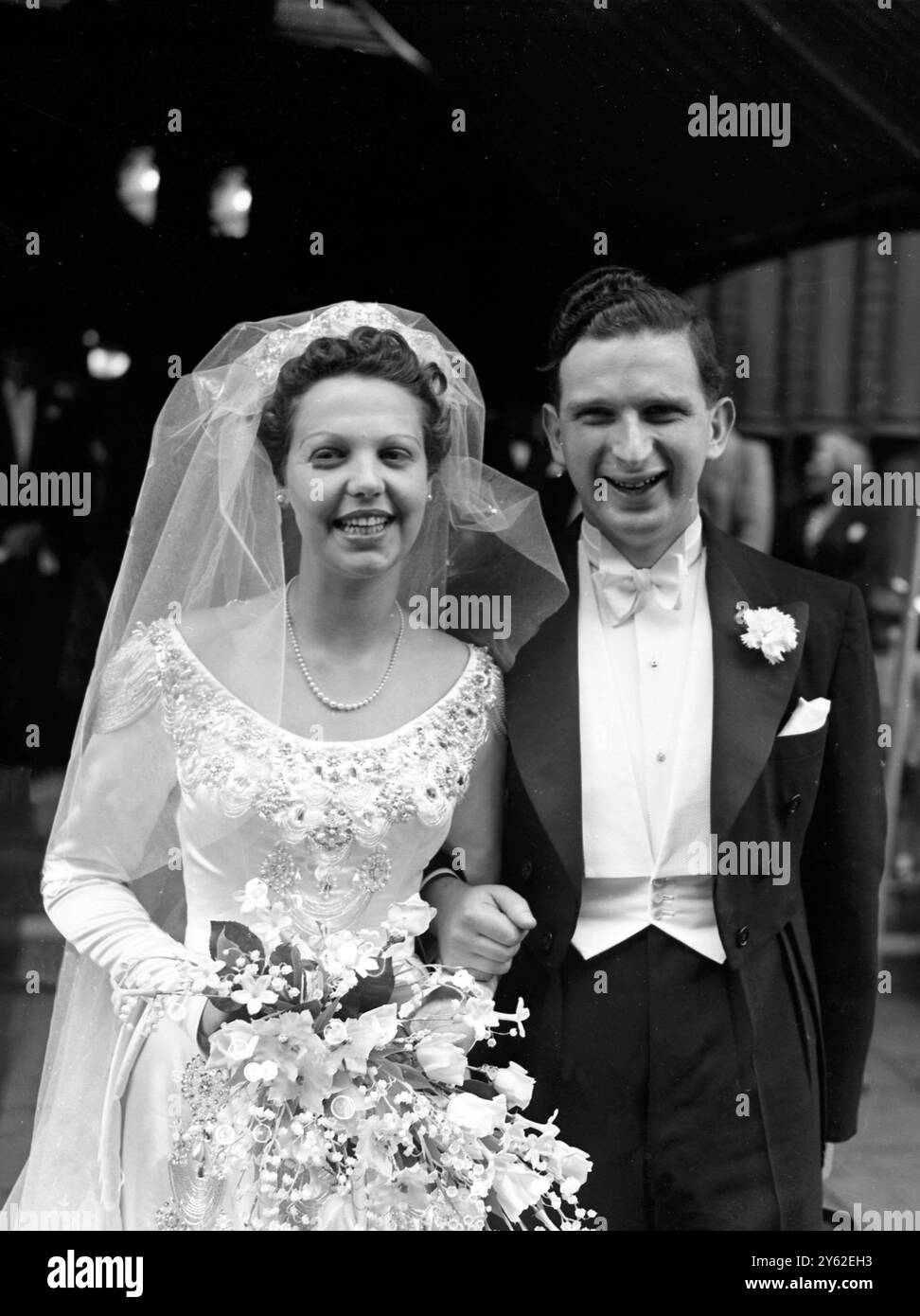 Beautifully embroidered gown with wide , round neckline is worn by the ...