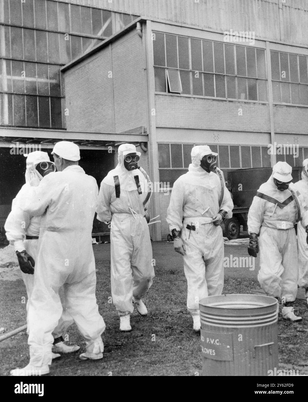 Windscale, Cumberland: Process workers wearing protective clothing as ...