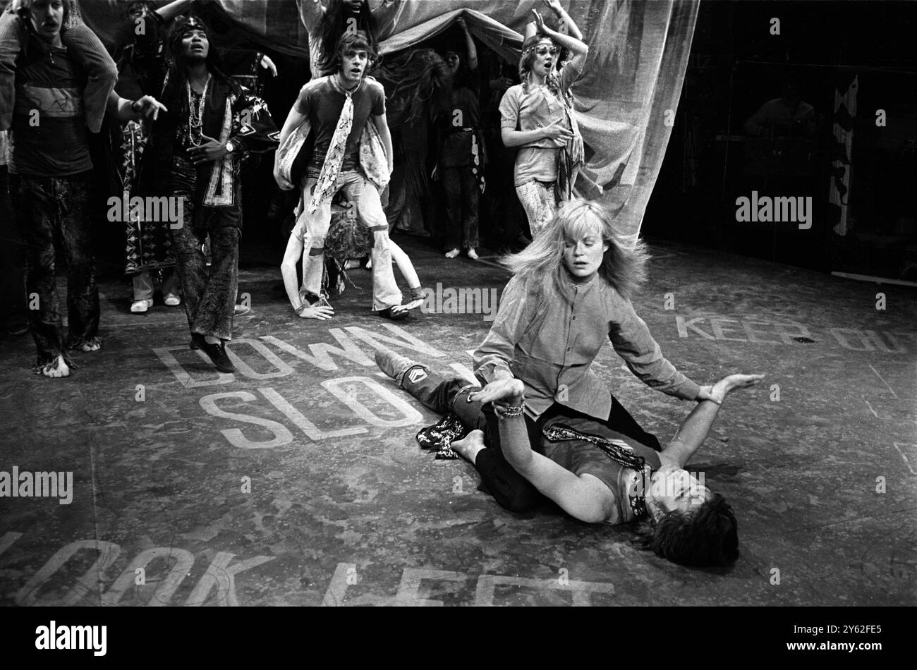 A scene from the controversial American " hippie " musical " Hair ...