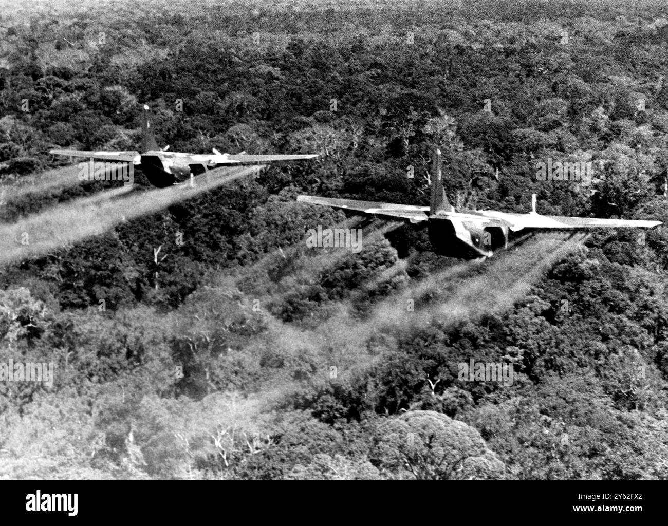 US air squadron spraying the canopy with defoliant (agent orange ...