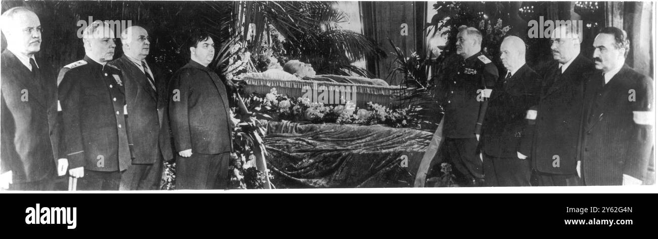 Russian leaders flank the open coffin of Marshal Stalin in Moscow from ...