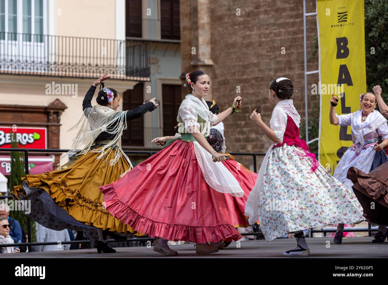 Traditional dancers in Valencia, Spain perform in Plaza de la Reina ...