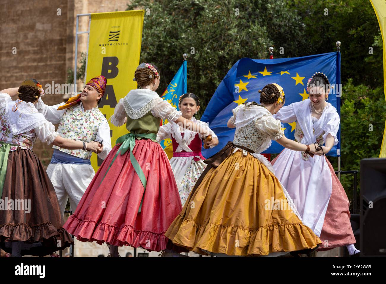 Traditional dancers in Valencia, Spain perform in Plaza de la Reina ...