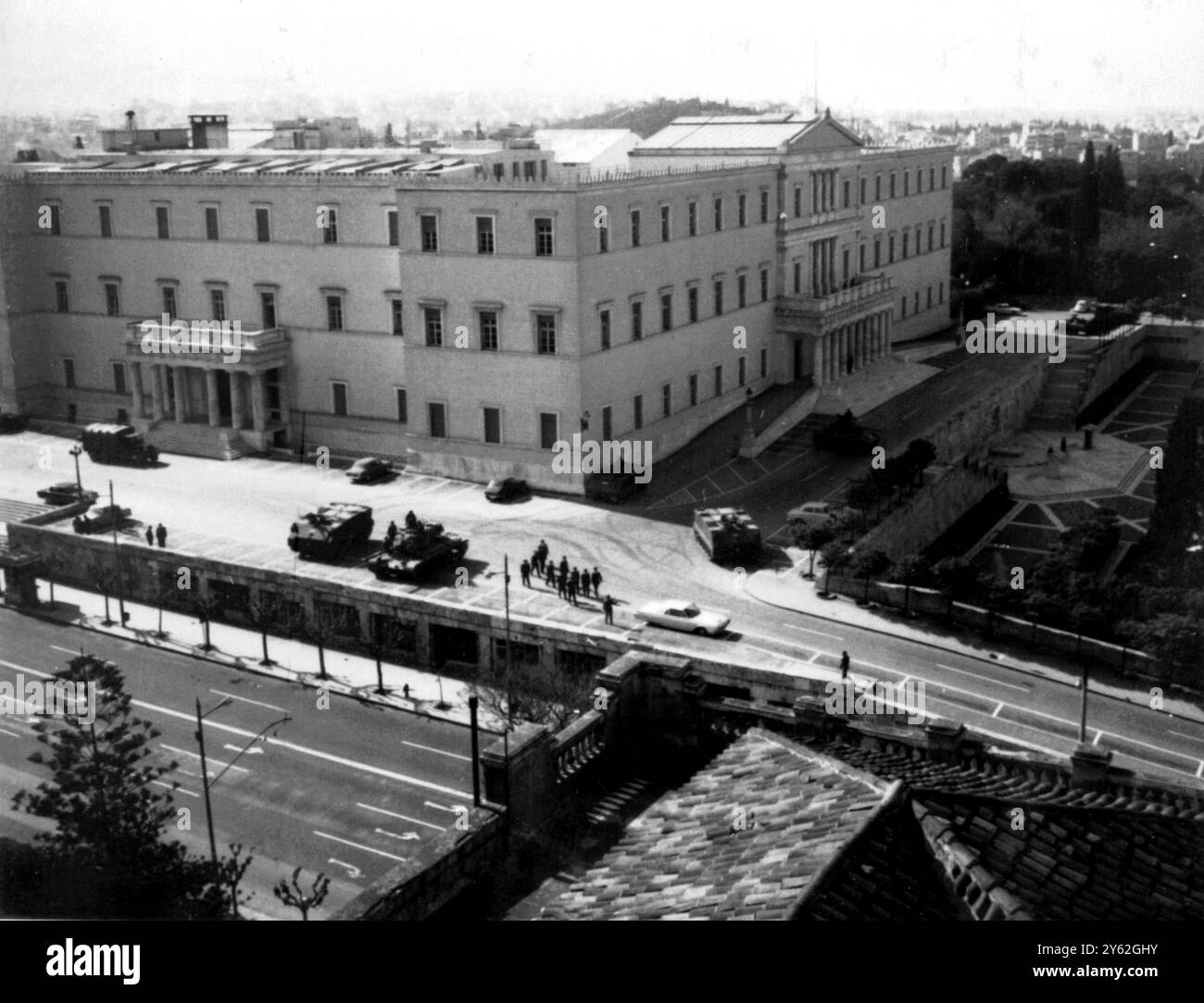 Half tracked troop carriers, tanks and Army trucks, surround Greece's ...
