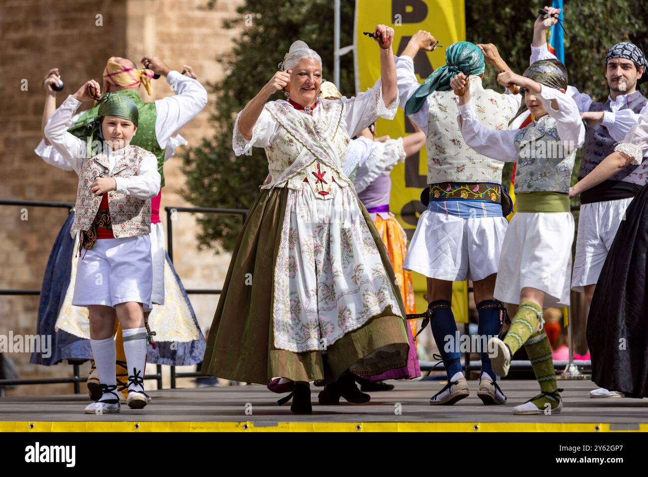 Traditional dancers in Valencia, Spain perform in Plaza de la Reina ...