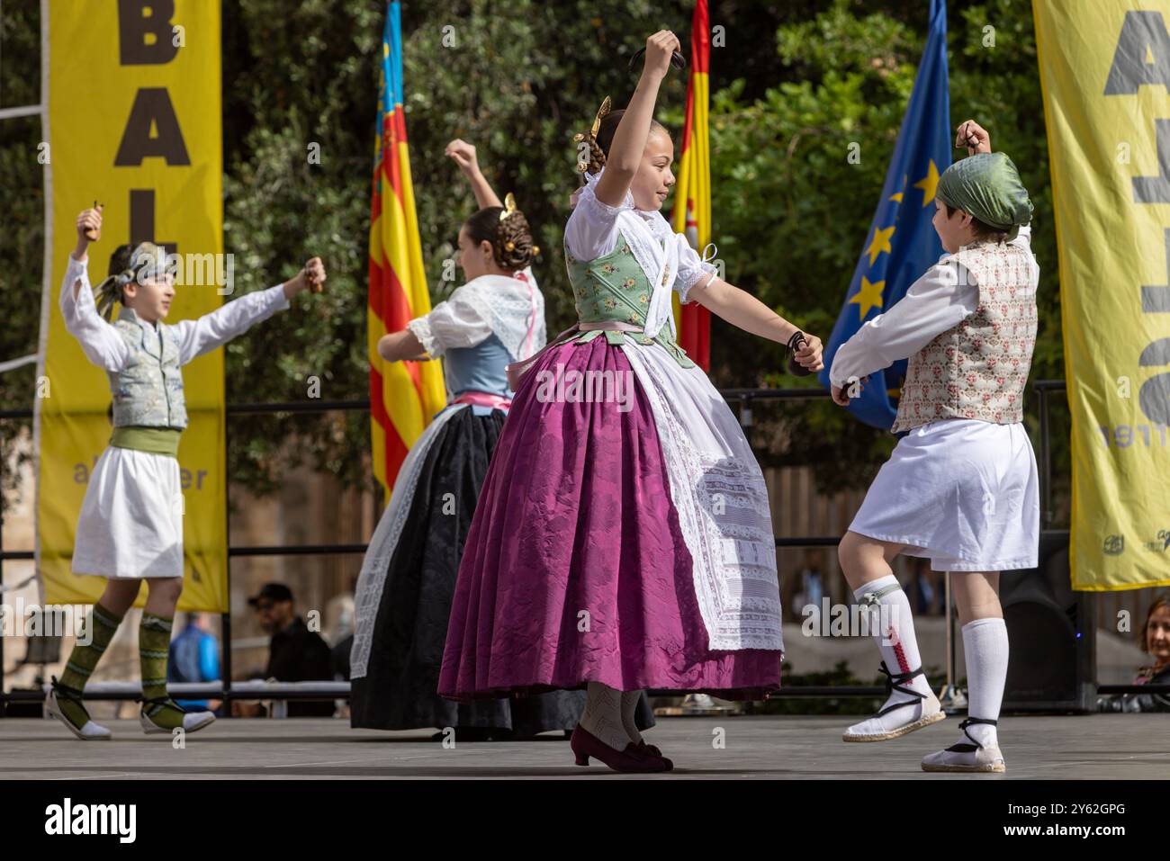 Traditional dancers in Valencia, Spain perform in Plaza de la Reina ...