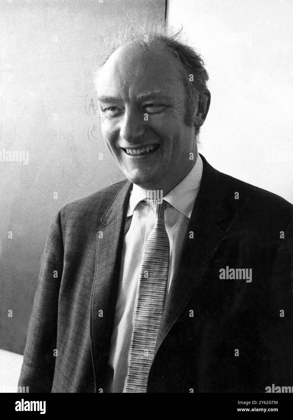 Pictured in his study at Cambridge is Dr. Francis Crick who, according ...