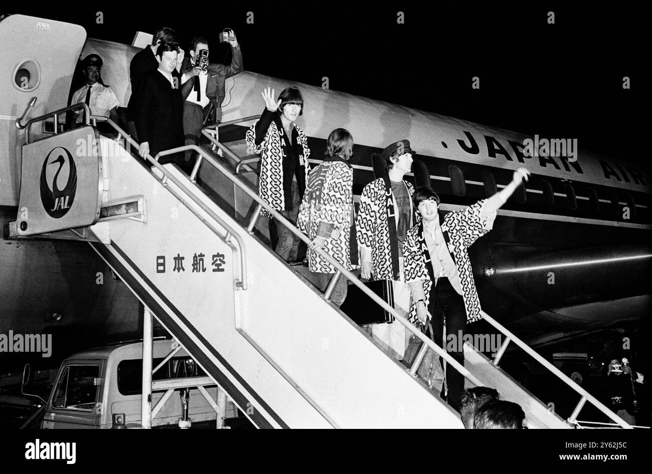 Dressed in happi coats often worn by Japanese workmen the Beatles ...