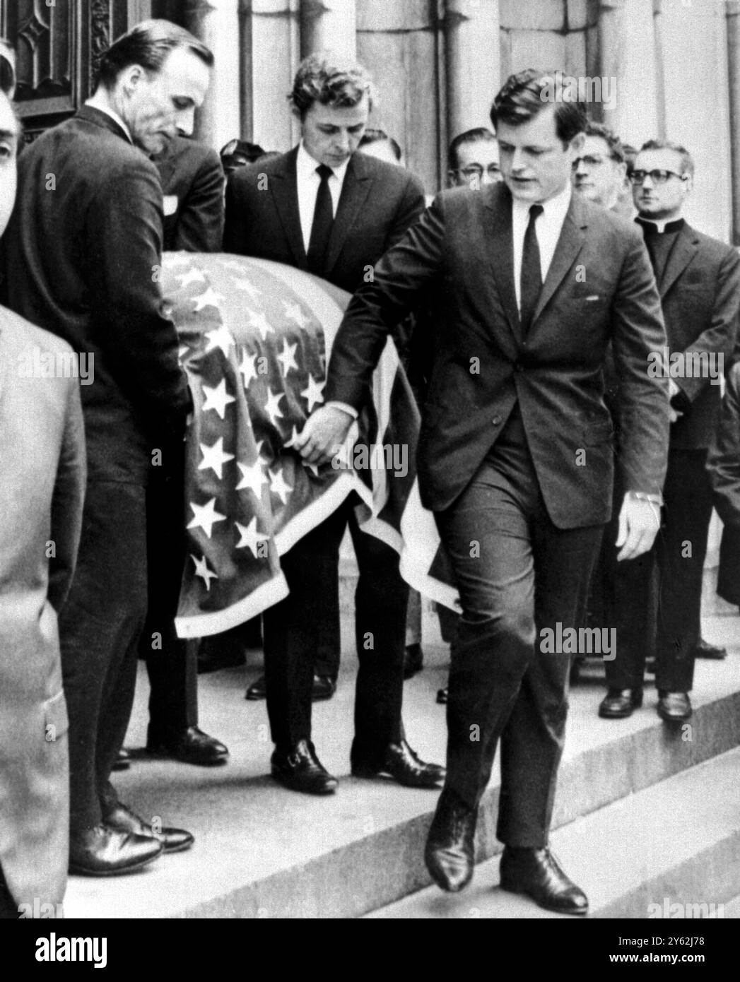 Senator Edward Kennedy helps carry the casket from St Patricks ...
