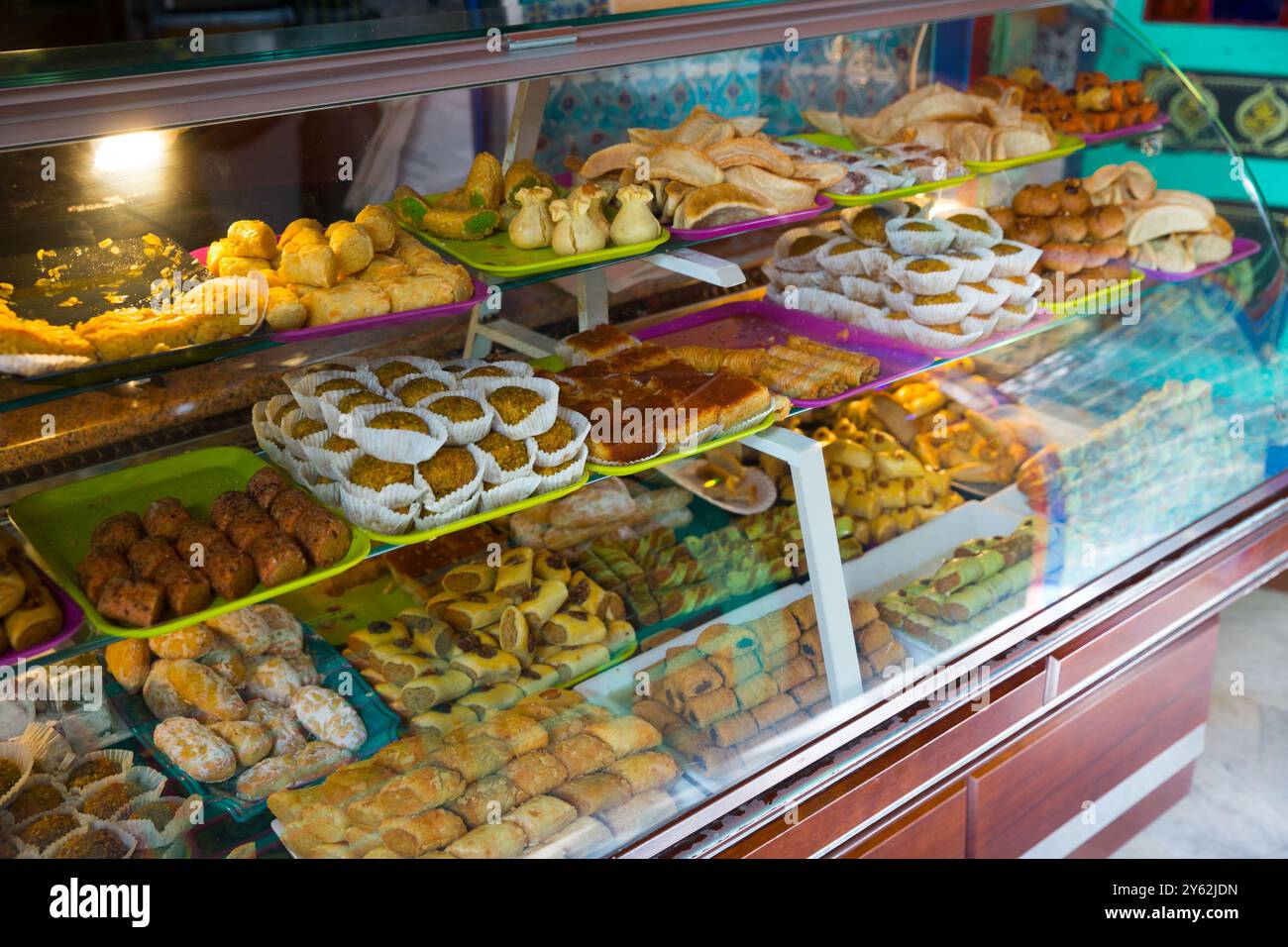Counter with many oriental sweets Stock Photo - Alamy