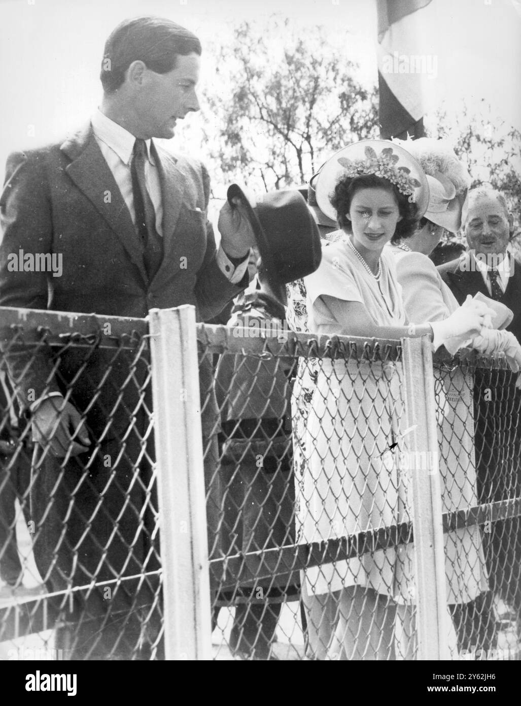 Group Captain Townsend and Princess Margaret looking over into a ...
