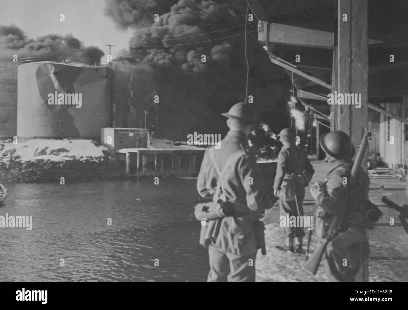 BRITISH TROOPS SET FIRE TO OIL STORAGE WELLS DURING THEIR RAID ON THE ...