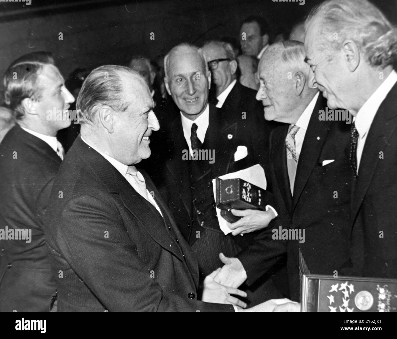 PRESIDENT OF NORWEGIAN NOBEL PEACE PRIZE COMMITEE GUNNAR JAHN PRESENTS ...