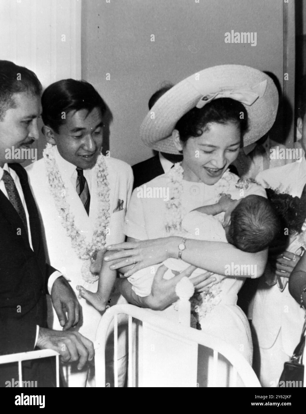 PRINCESS MICHIKO HOLDS ORPHAN BABY WATCHES BY PRINCE AKIHITO IN MANILA ...