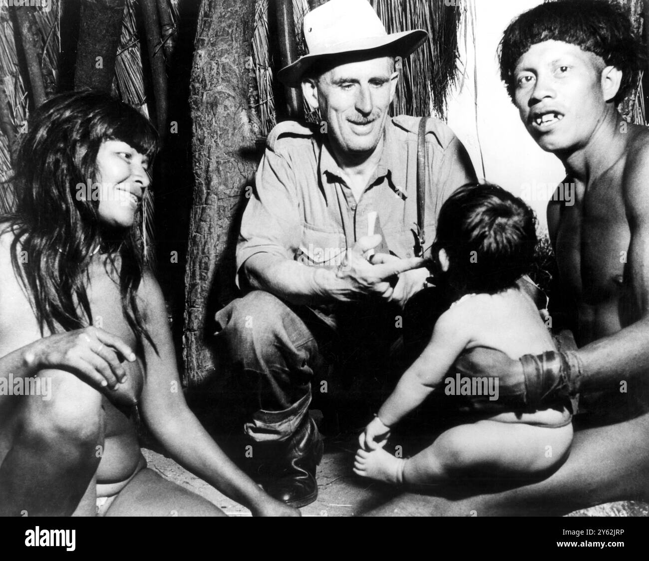 Brian Fawcett makes friends with the indians. 5 February 1952 Stock ...