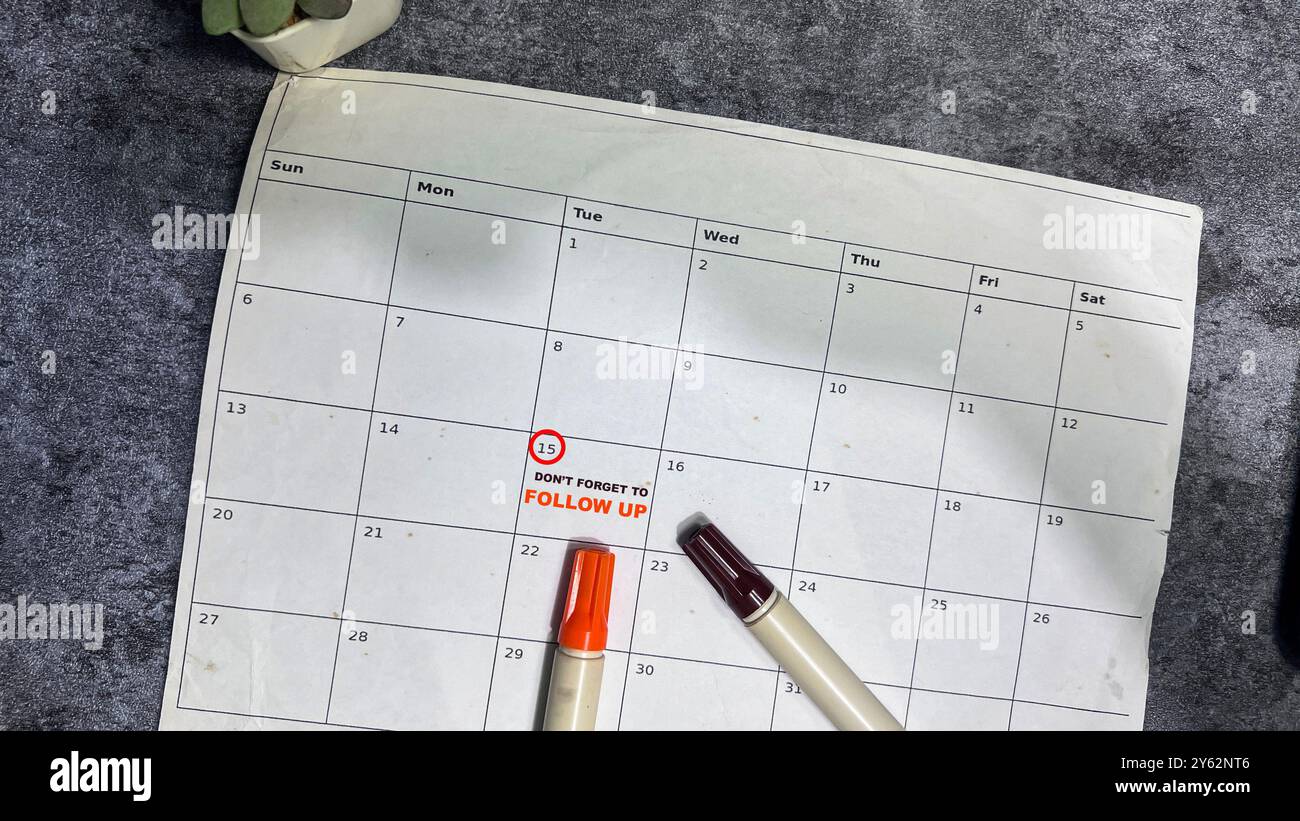 Don't Forget to Follow Up text white calendar background. Reminder or ...