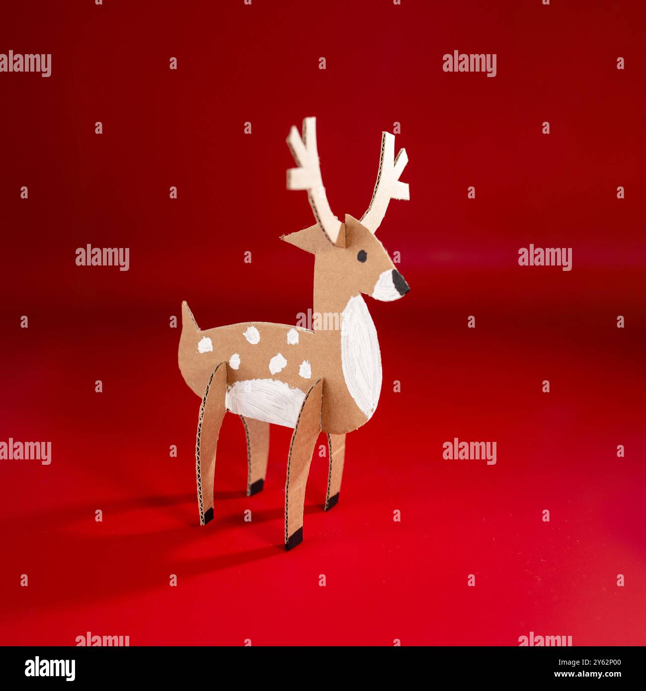 simple Christmas craft for kids, model of a deer made out of cut paper ...