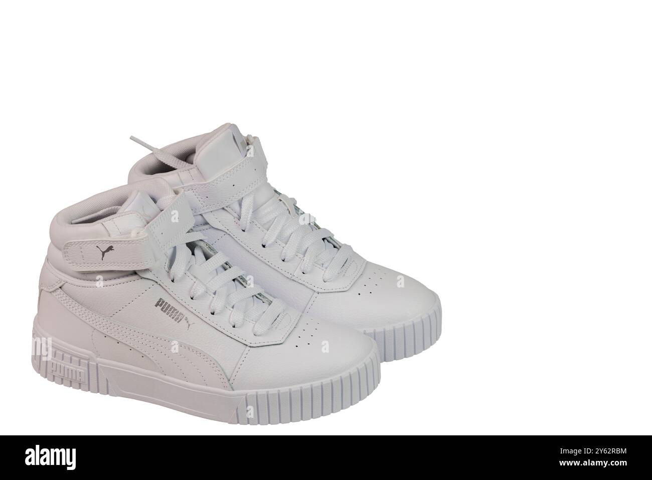 Close-up view of white high-top Puma sneakers isolated on white ...
