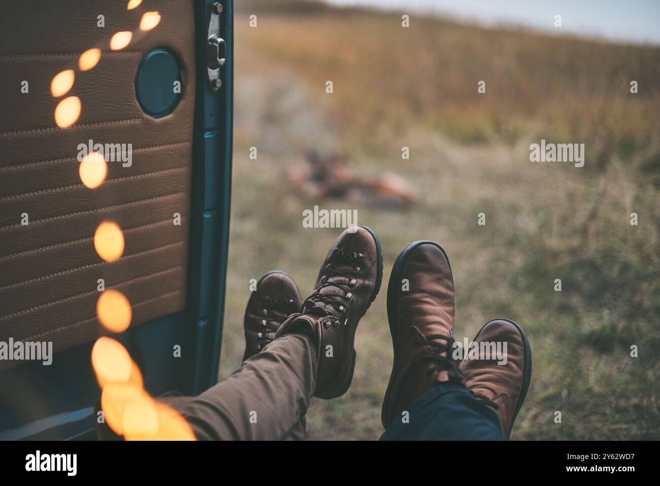 Romantic night. Close up of young couple resting inside of the retro ...